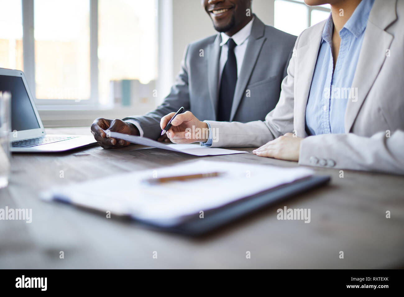 Pointing at paper Stock Photo - Alamy