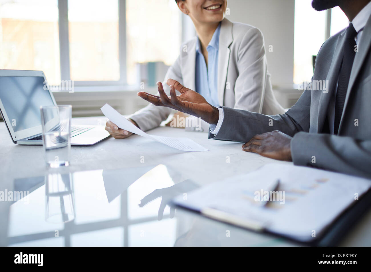 Hand over paper Stock Photo - Alamy