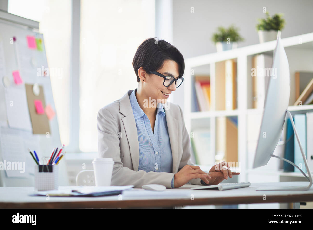 Young employee working workplace hi-res stock photography and images ...