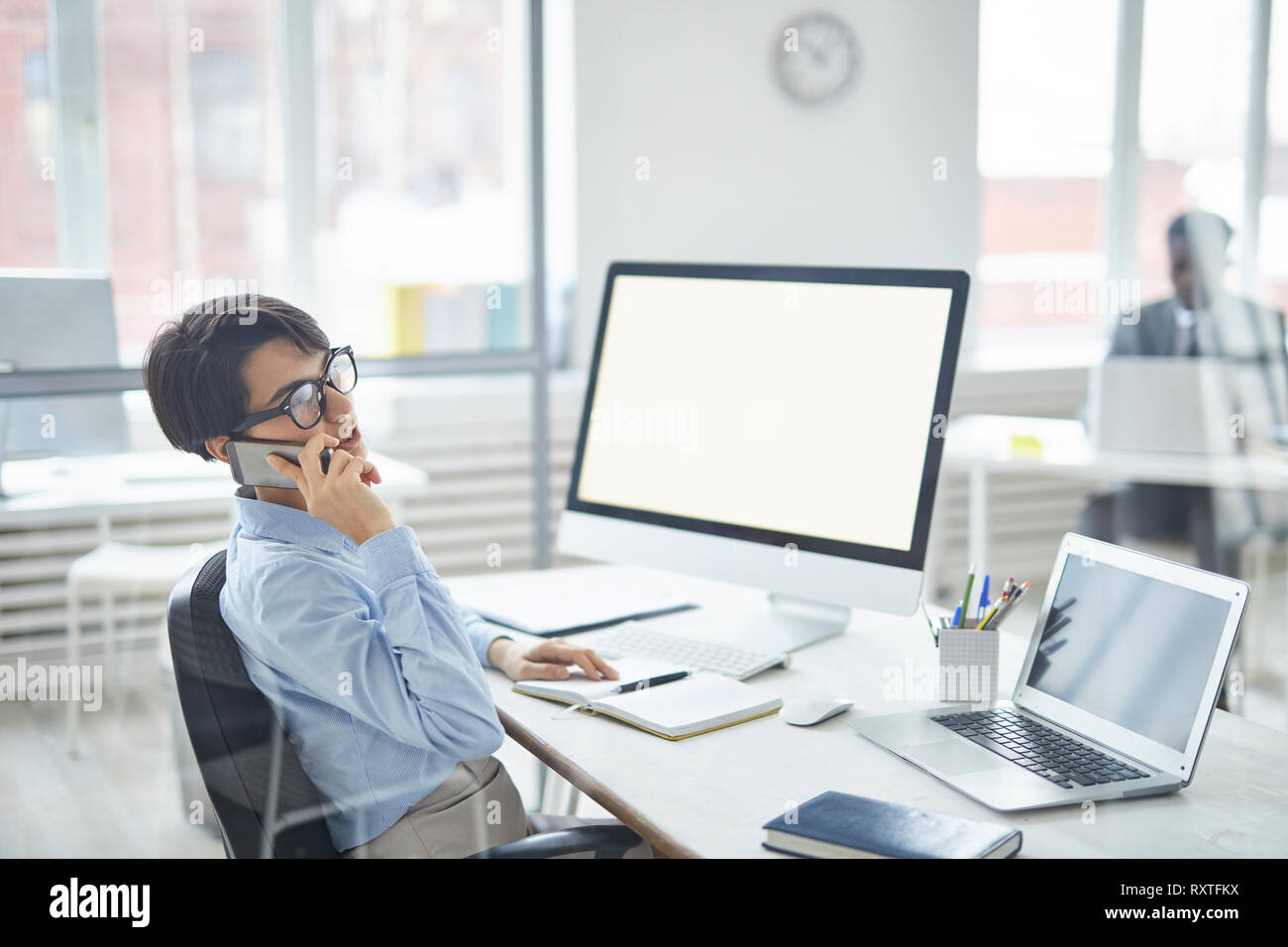 Employee calling hi-res stock photography and images - Alamy