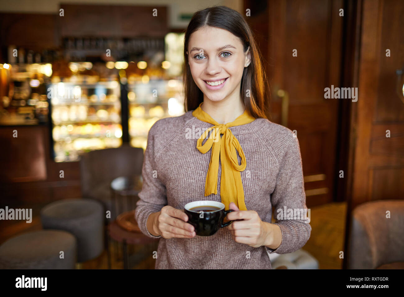 Girl with tea Stock Photo - Alamy