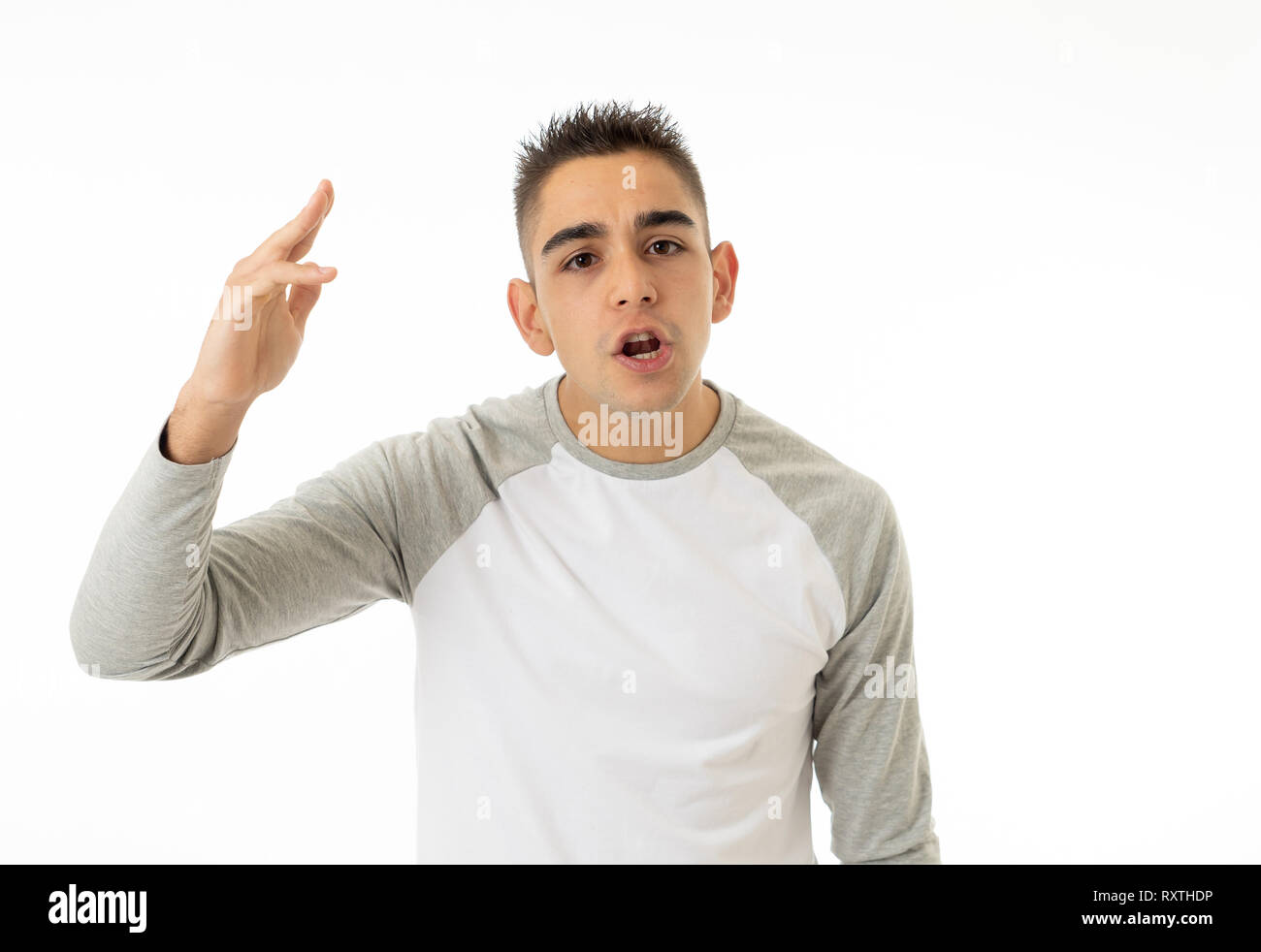 Portrait of angry and upset young man looking furious, aggressive and ...