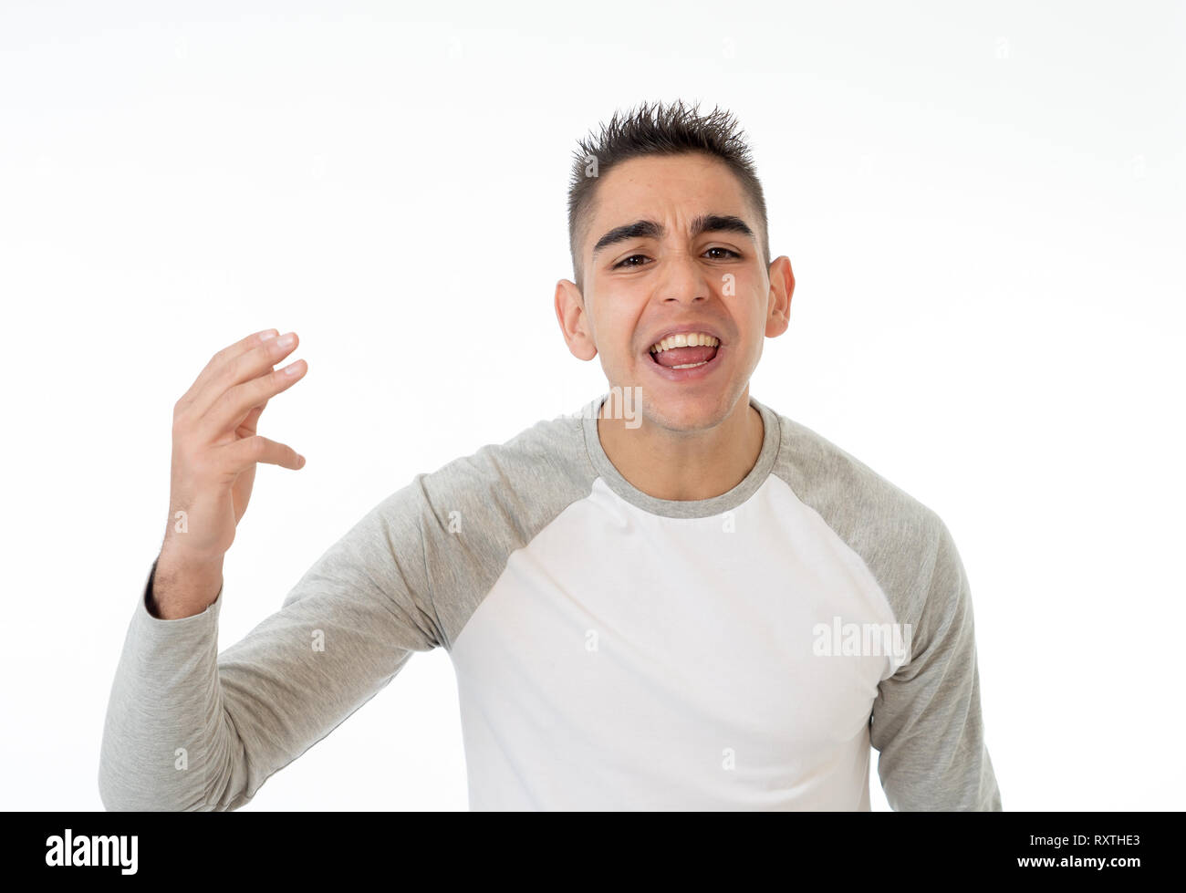 Portrait of angry and upset young man looking furious, aggressive and ...