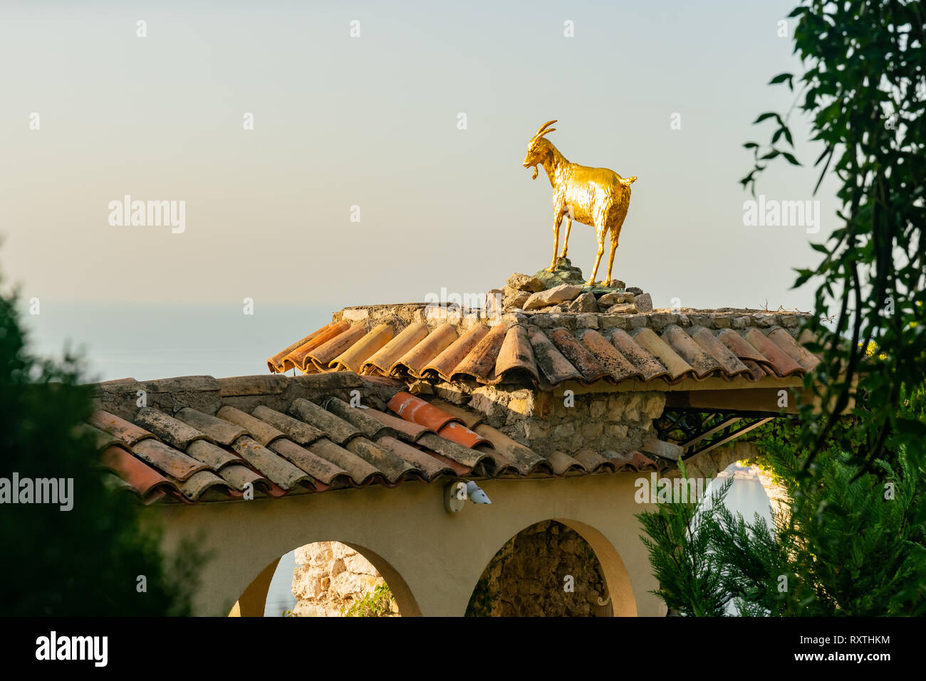Gold goat statue in the beautiful and historical Eze Village near Nice ...