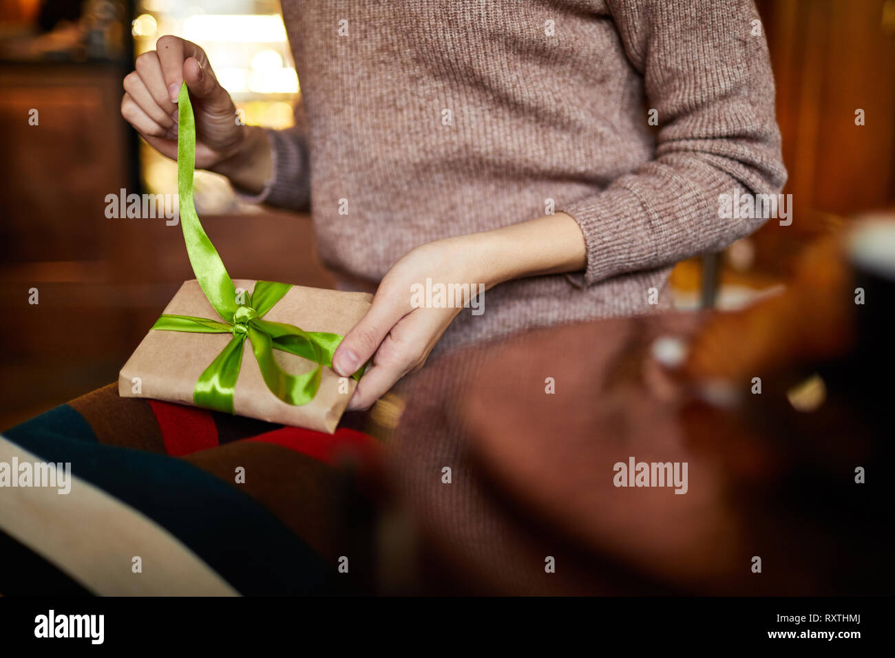 Adult unpacking present hi-res stock photography and images - Alamy