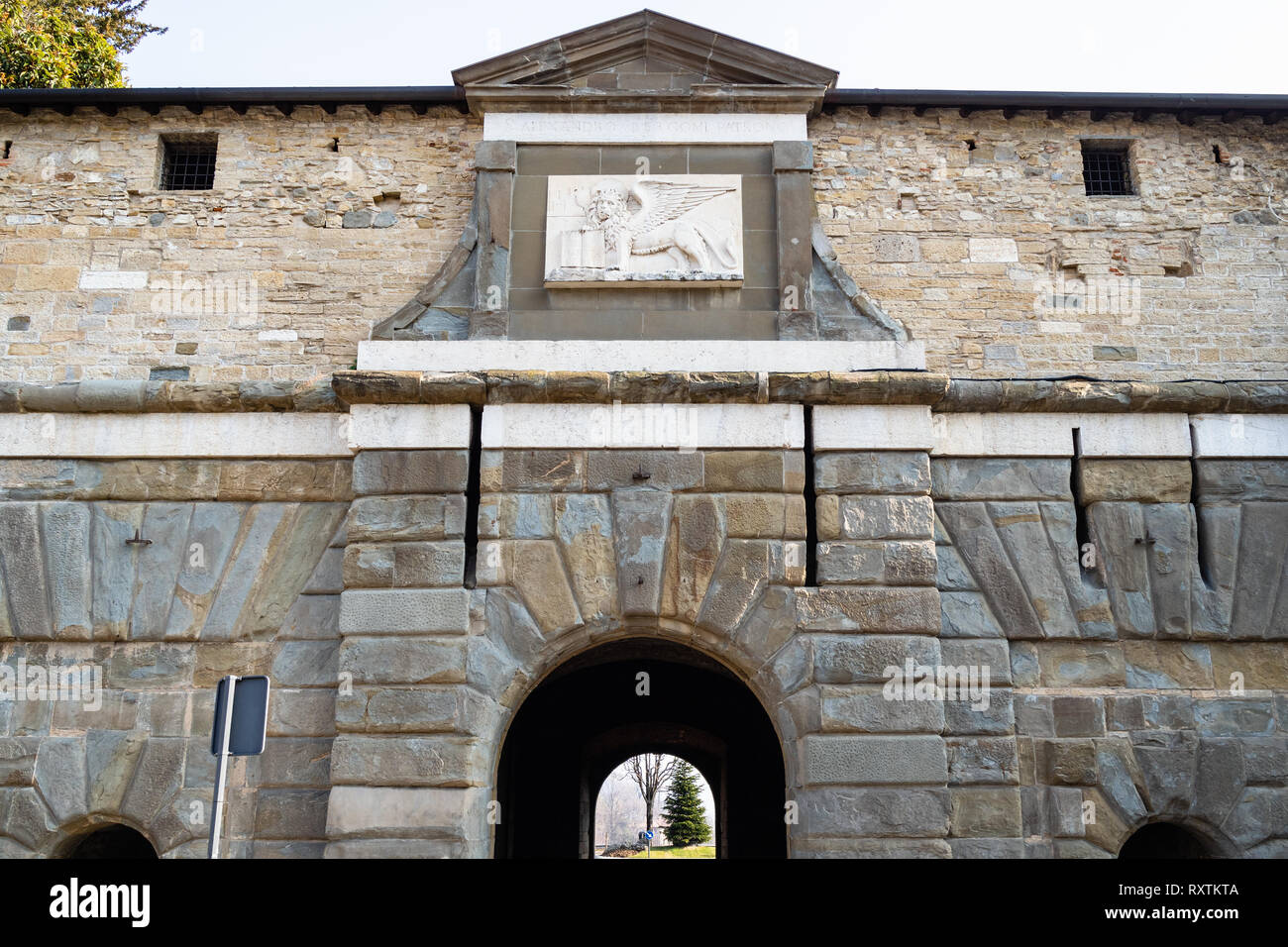 Travel to Italy - view the medieval gate Porta Sant Alessandro in ...