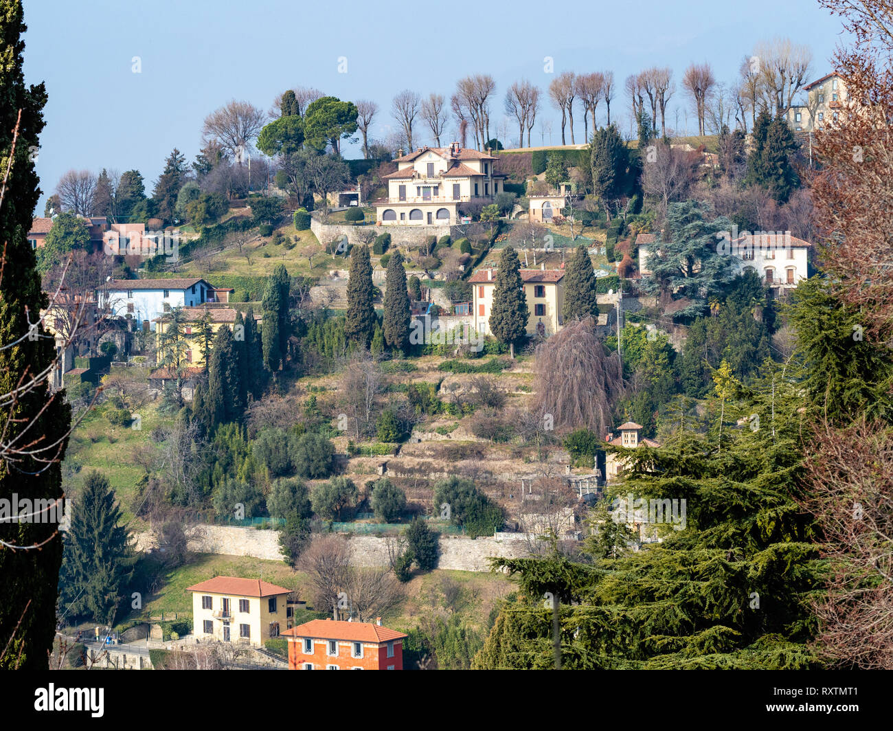 Travel to Italy - view of neighborhood of Bergamo city on hill from San ...