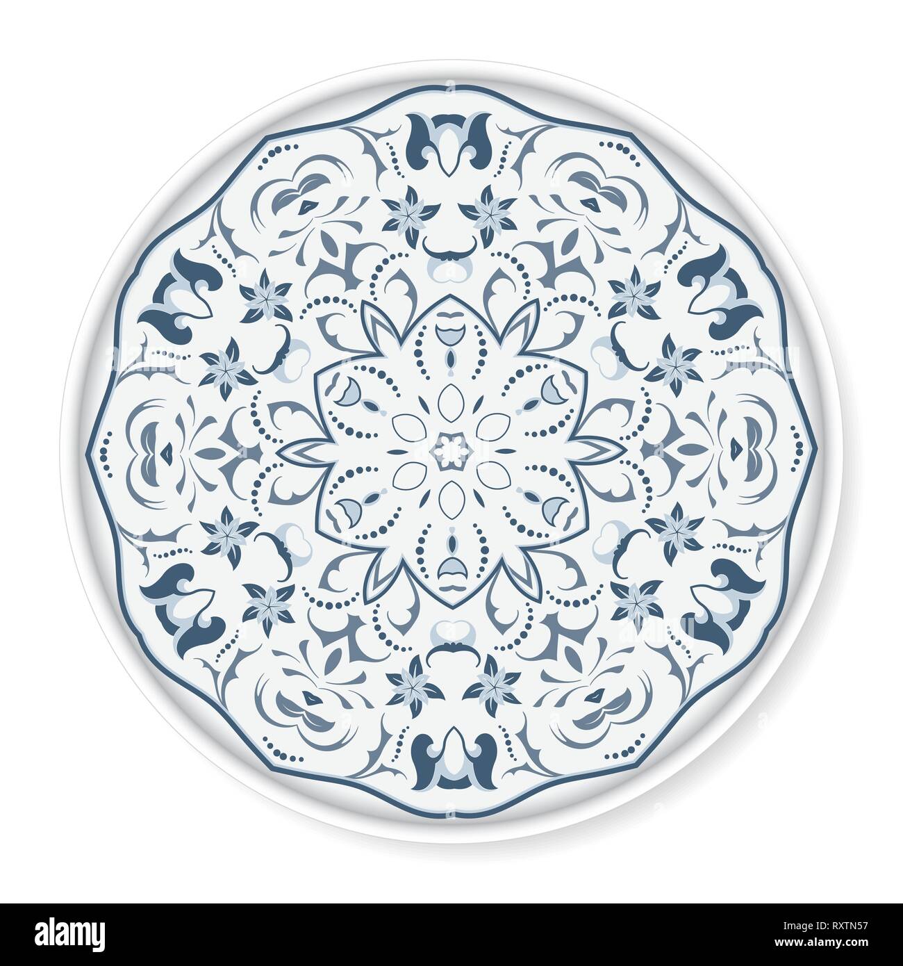 Decorative plate with a circular blue pattern, top view. White ...