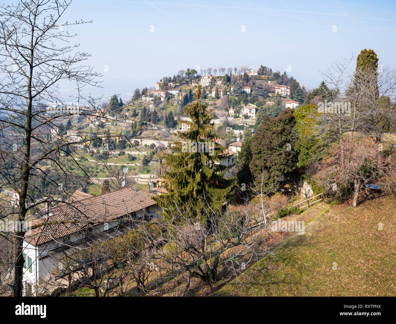 Travel to Italy - view of quarter of Bergamo city on hill from San ...