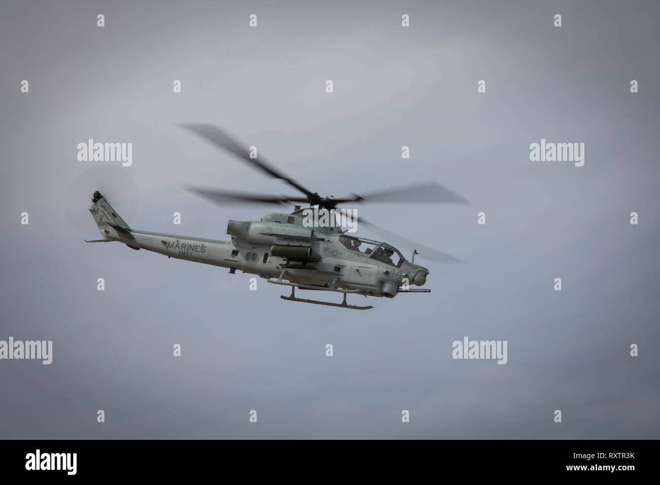 A U.S. Marine Corps AH-1 Viper attack helicopter demonstrates slow ...