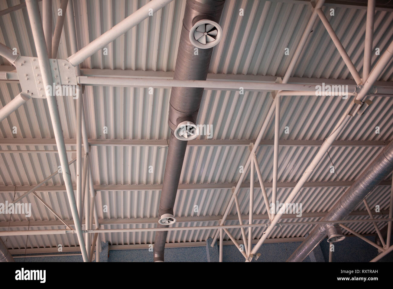 Ventilation system on the ceiling of large buildings. Ventilation pipes ...