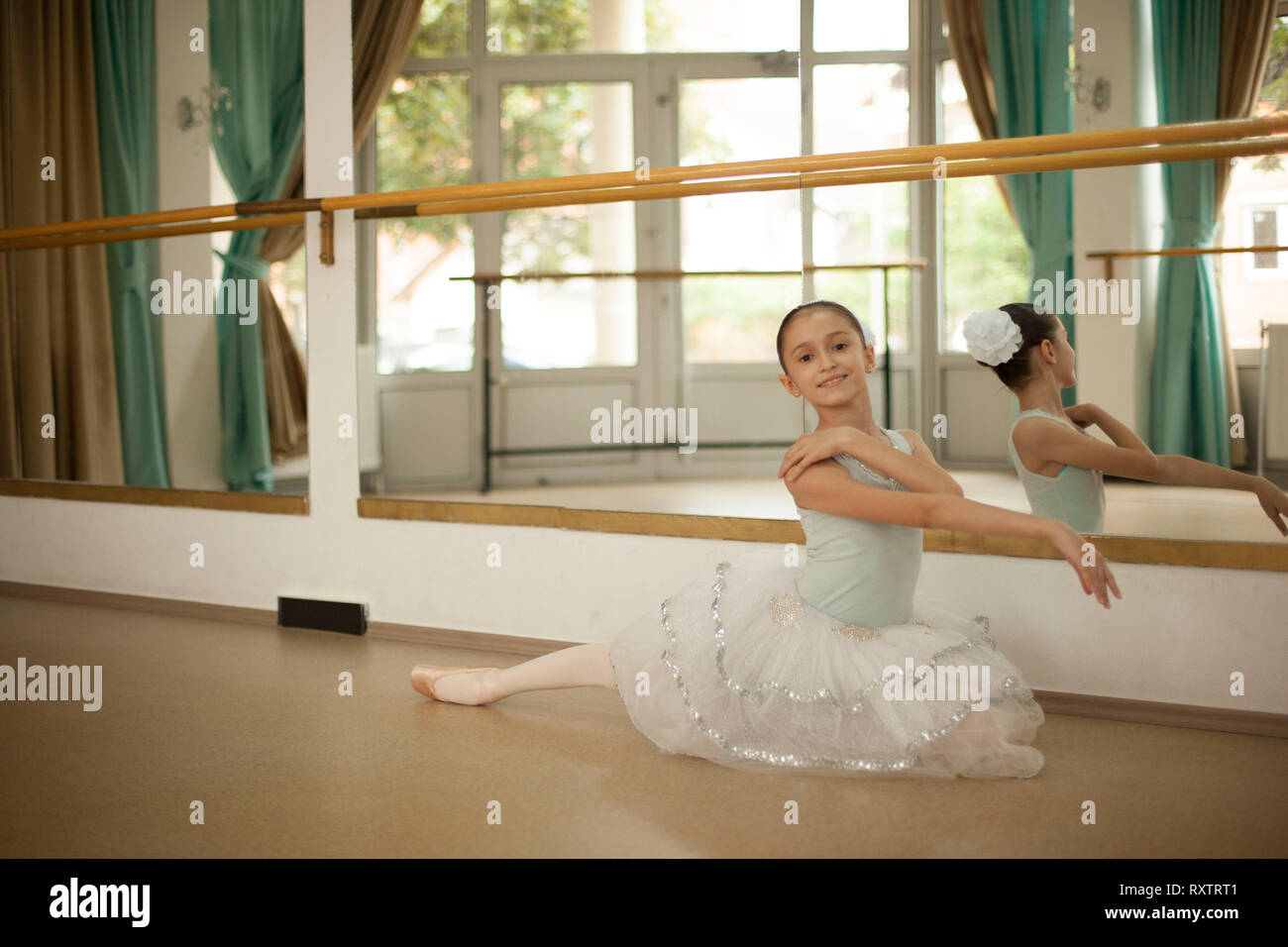 Little ballerina in ballet studio Stock Photo - Alamy