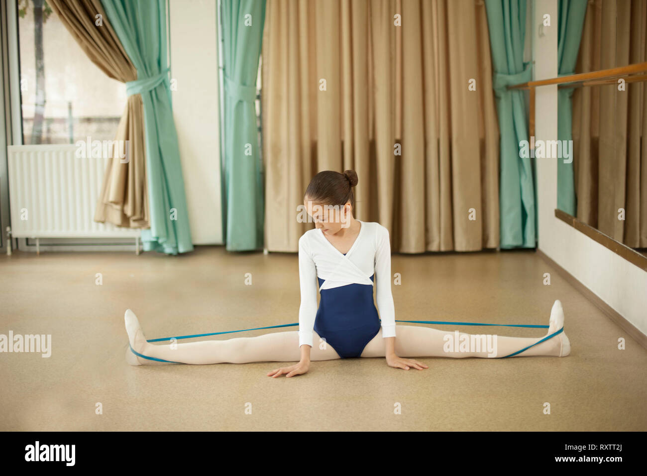 Little ballerina in ballet studio Stock Photo - Alamy