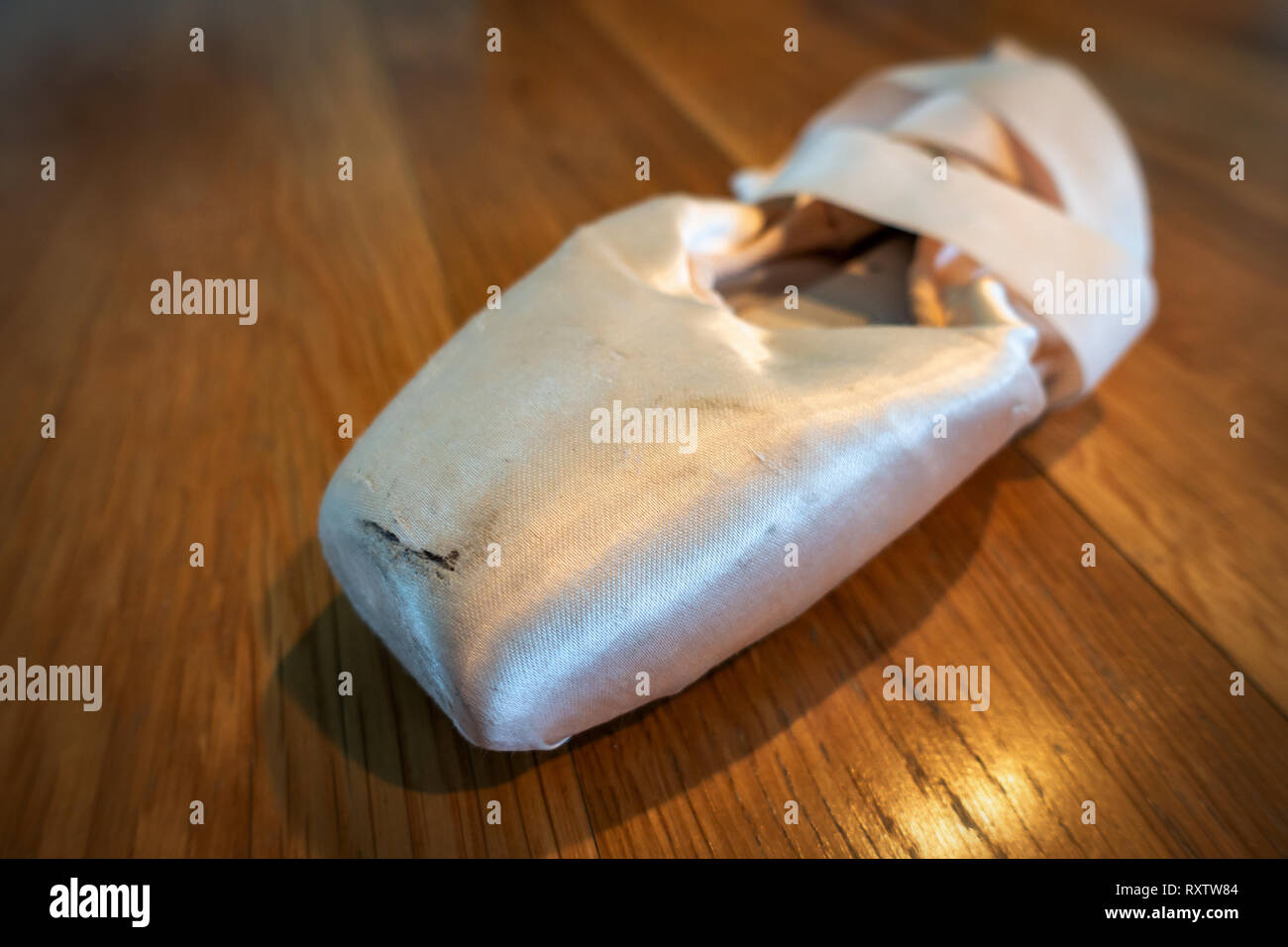 Single Classical Ballet pointe shoe, Ballerinas and Pointe Shoe on a ...