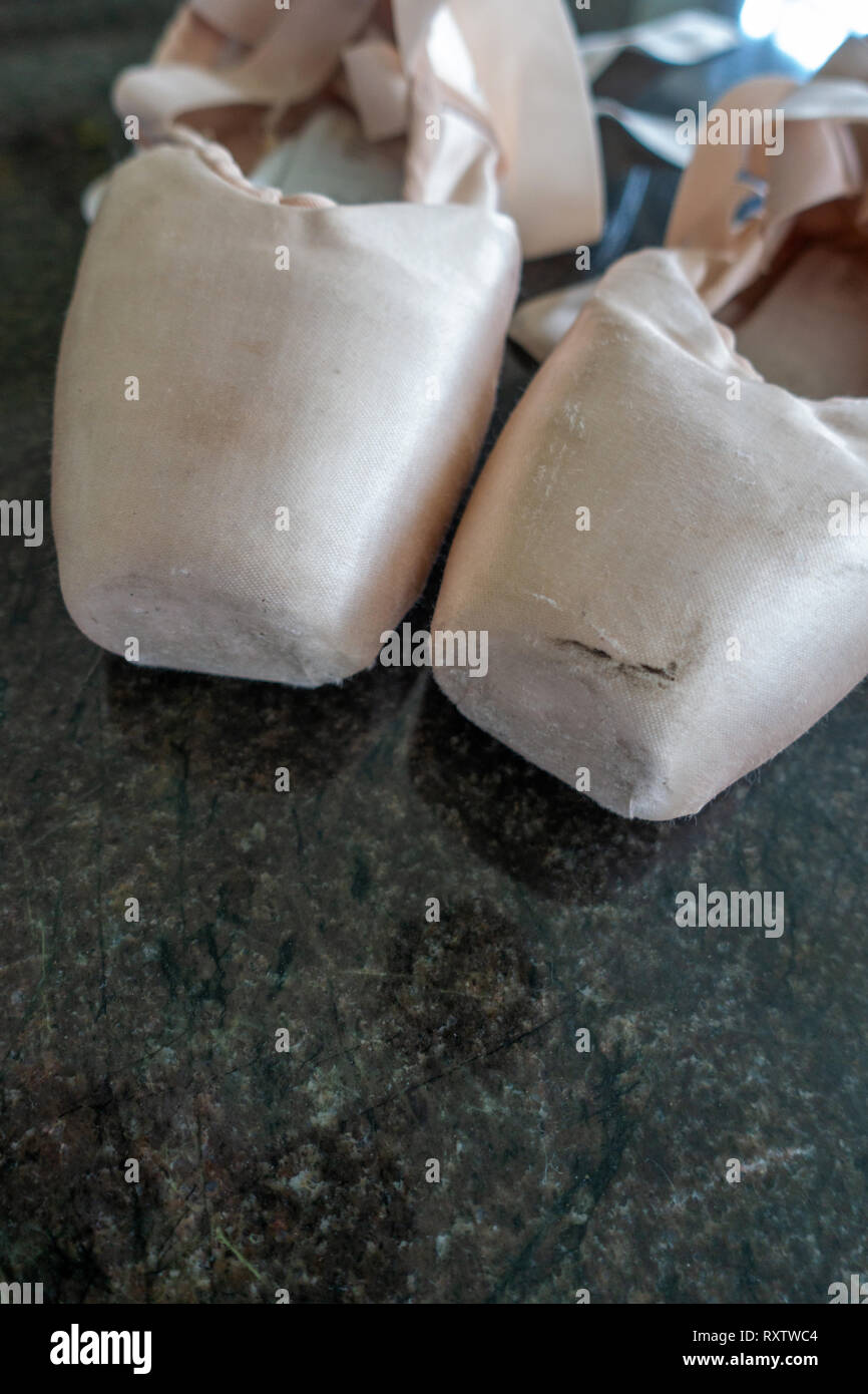 Close up looking down at a worn pair of Girls Canvas Ballet Pointe ...