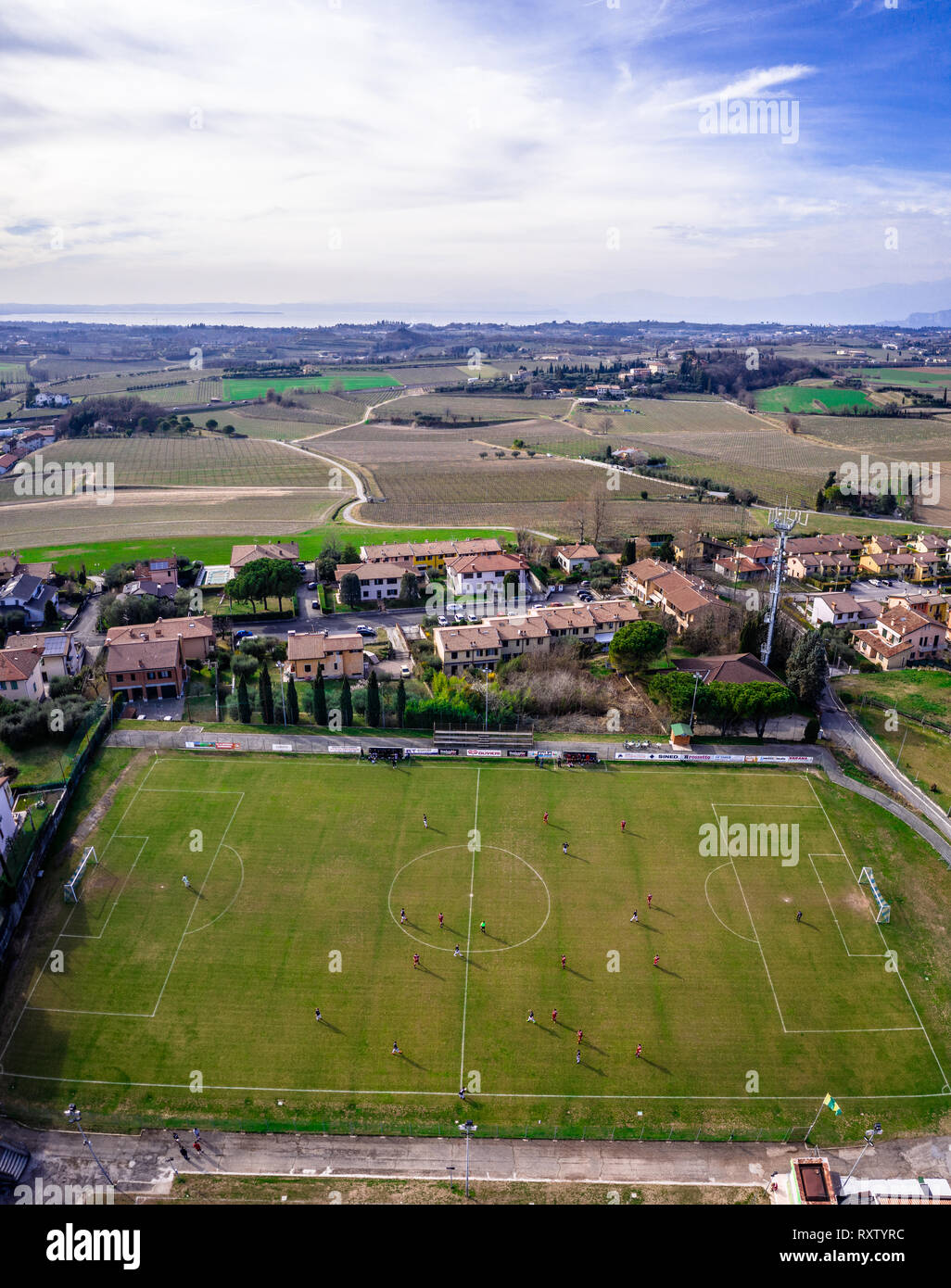 Top view from drone of football soccer field- Two teams playing a match ...