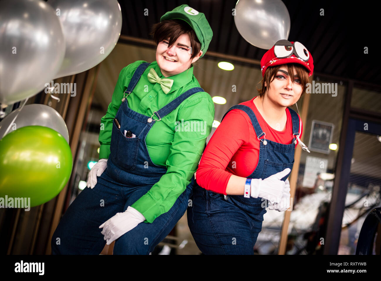 Cosplayers dressed as their favourite superheros or film characters in ...