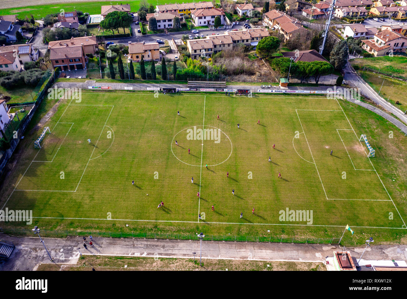 Top view from drone of football soccer field- Two teams playing a match ...