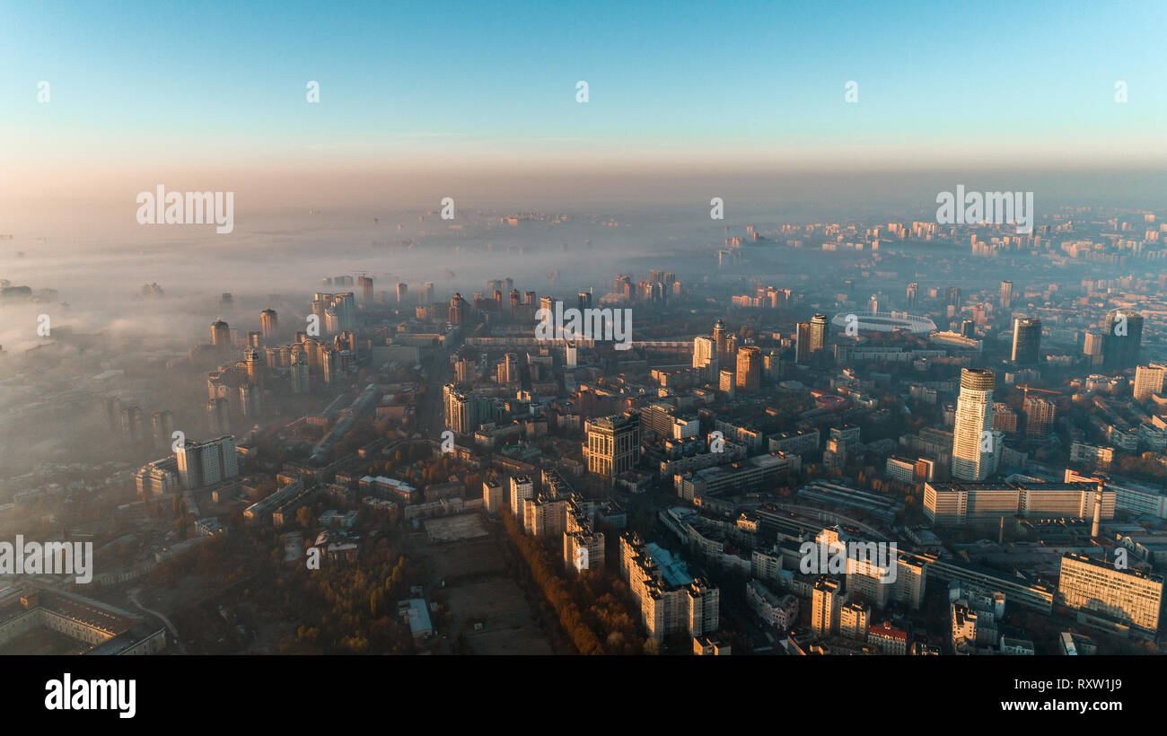 Aerial view of the city in dense fog Stock Photo - Alamy