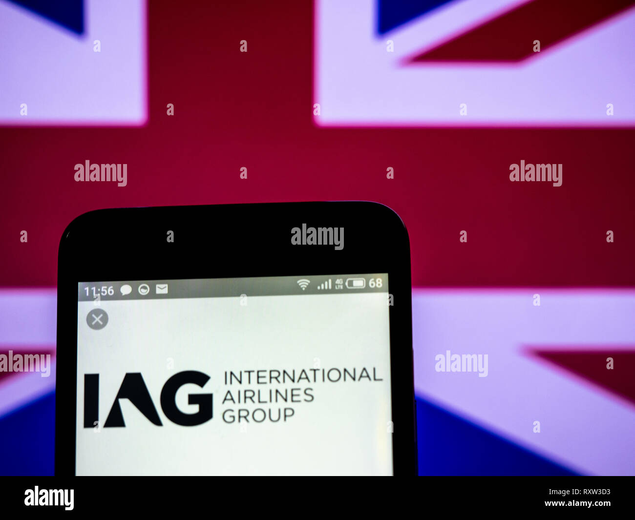 International Airlines Group logo seen displayed on smart phone Stock ...