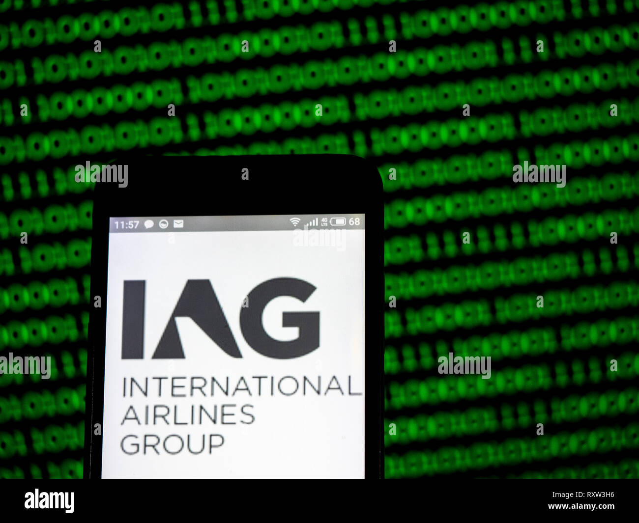 International Airlines Group logo seen displayed on smart phone Stock ...