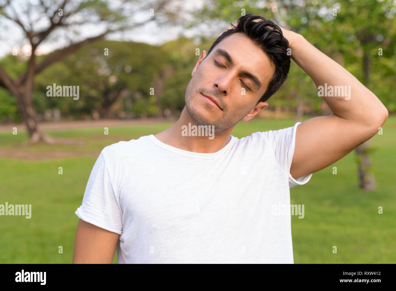 Guy stretching neck muscle hi-res stock photography and images - Alamy