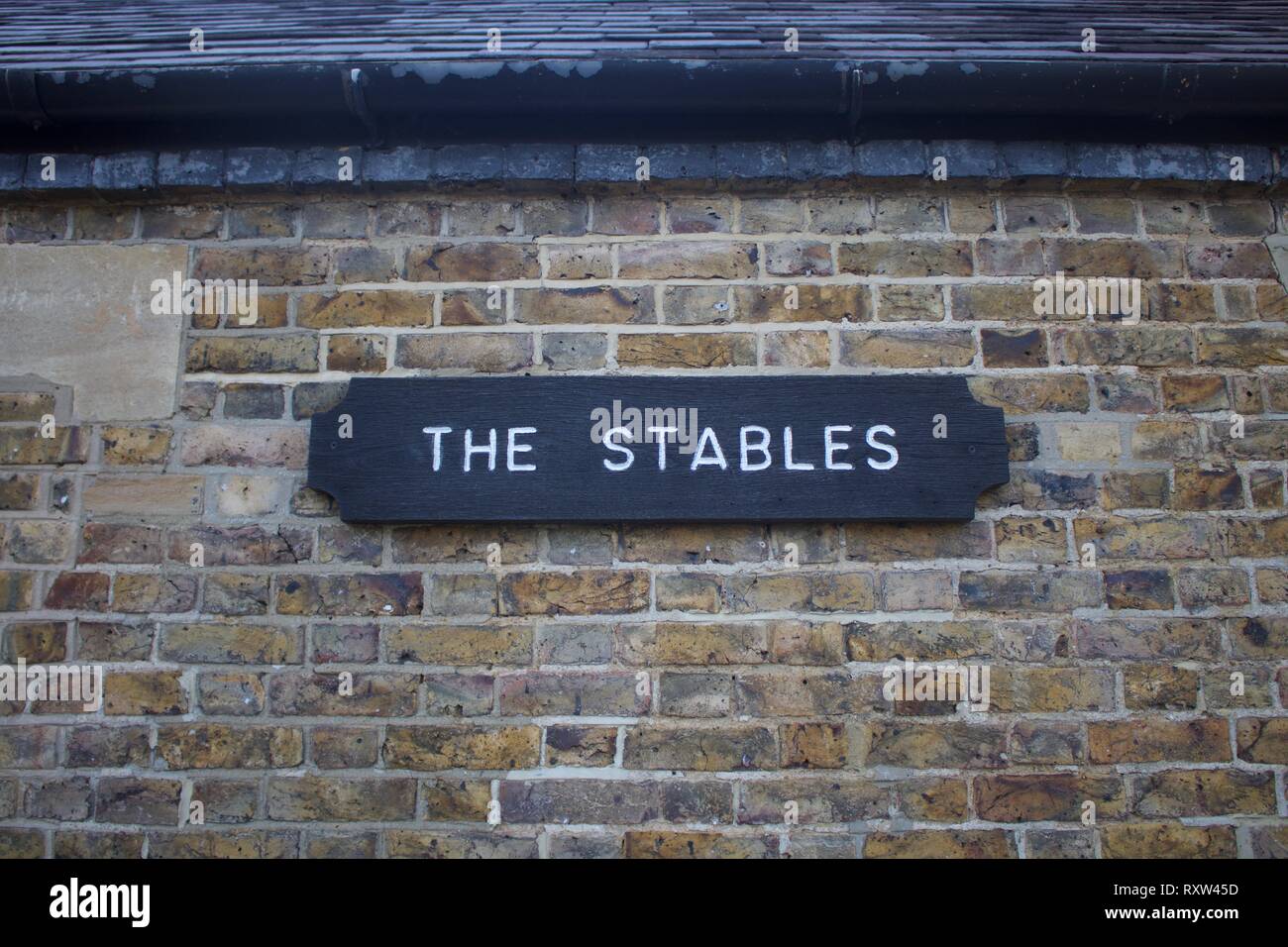 Sign signage brick bricks wall brickwork hi-res stock photography and ...