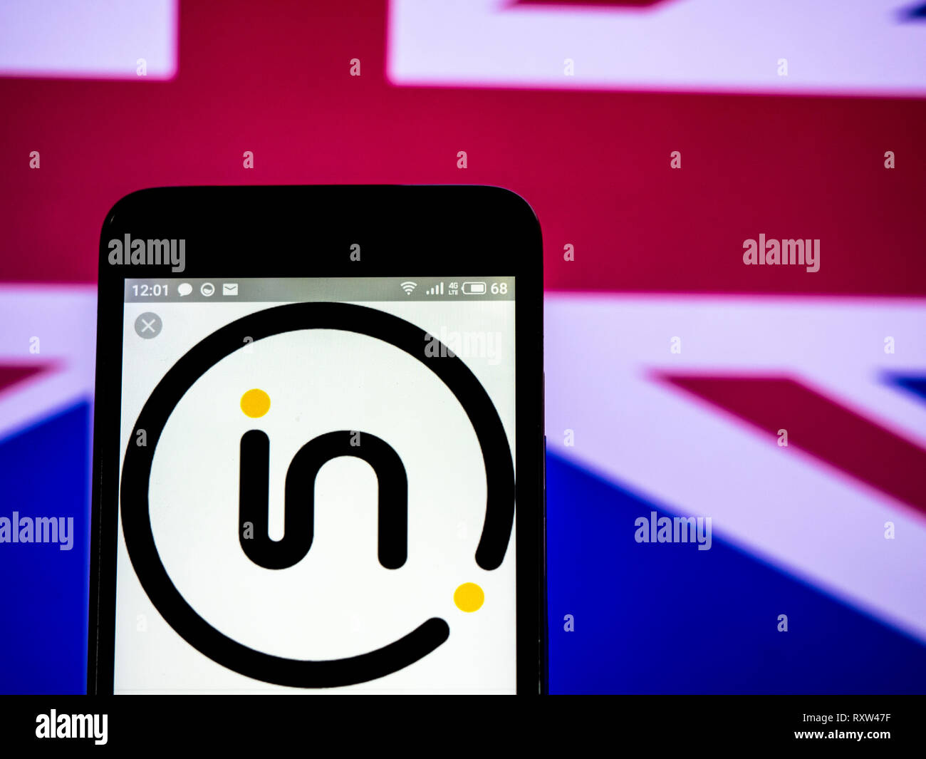 Intertek Group plc company logo seen displayed on smart phone Stock ...