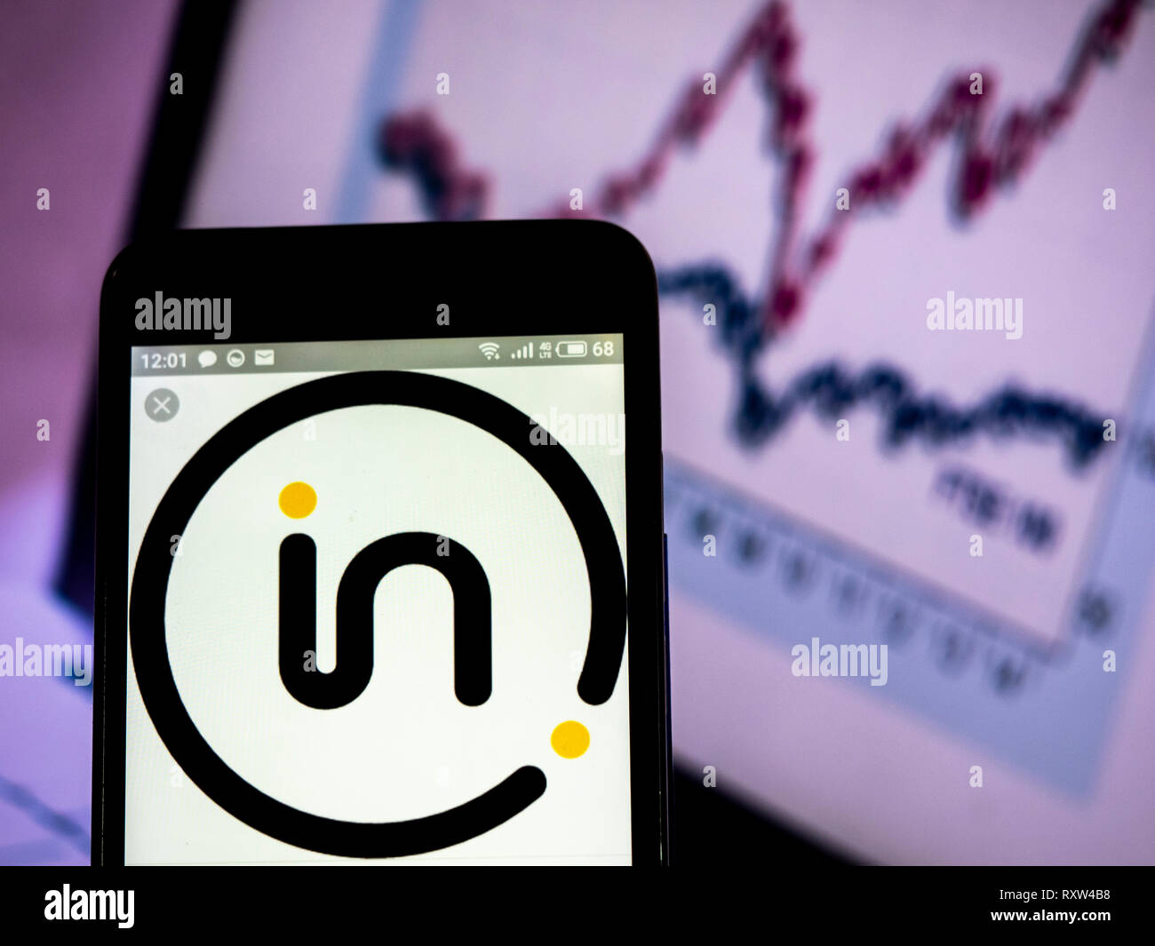 Intertek Group plc company logo seen displayed on smart phone Stock ...