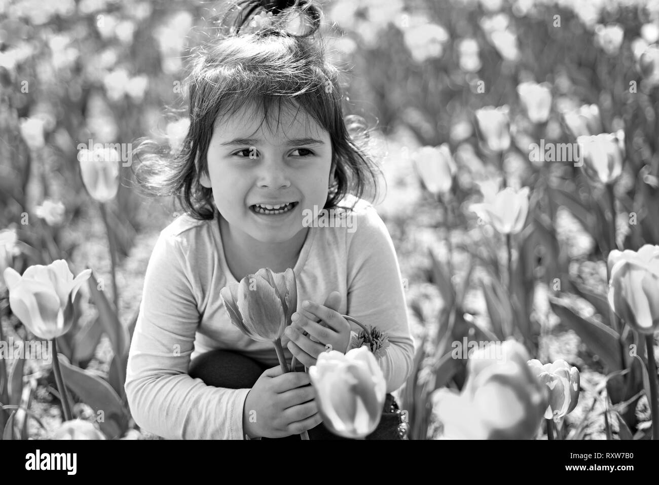 Spring beauty. Little girl in sunny spring. Summer girl fashion. Happy ...
