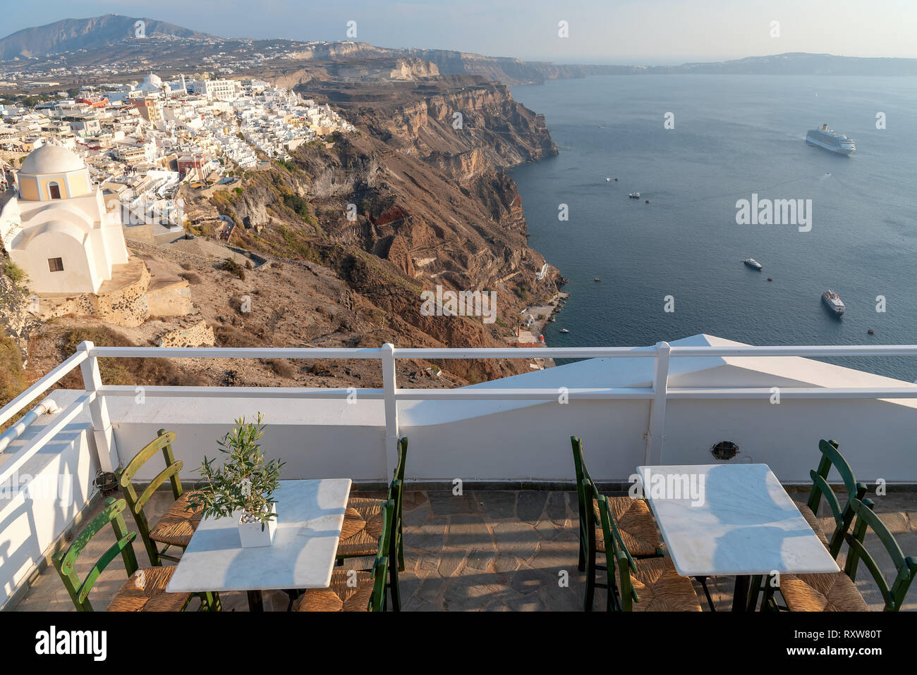 View of terrace on the Mediterranean sea - Thira village - Aegean sea ...