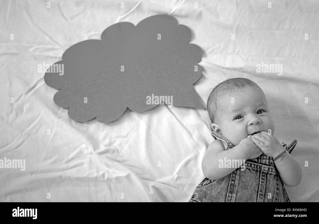 Say something. Childhood happiness. Small girl. I can speak. Word in ...