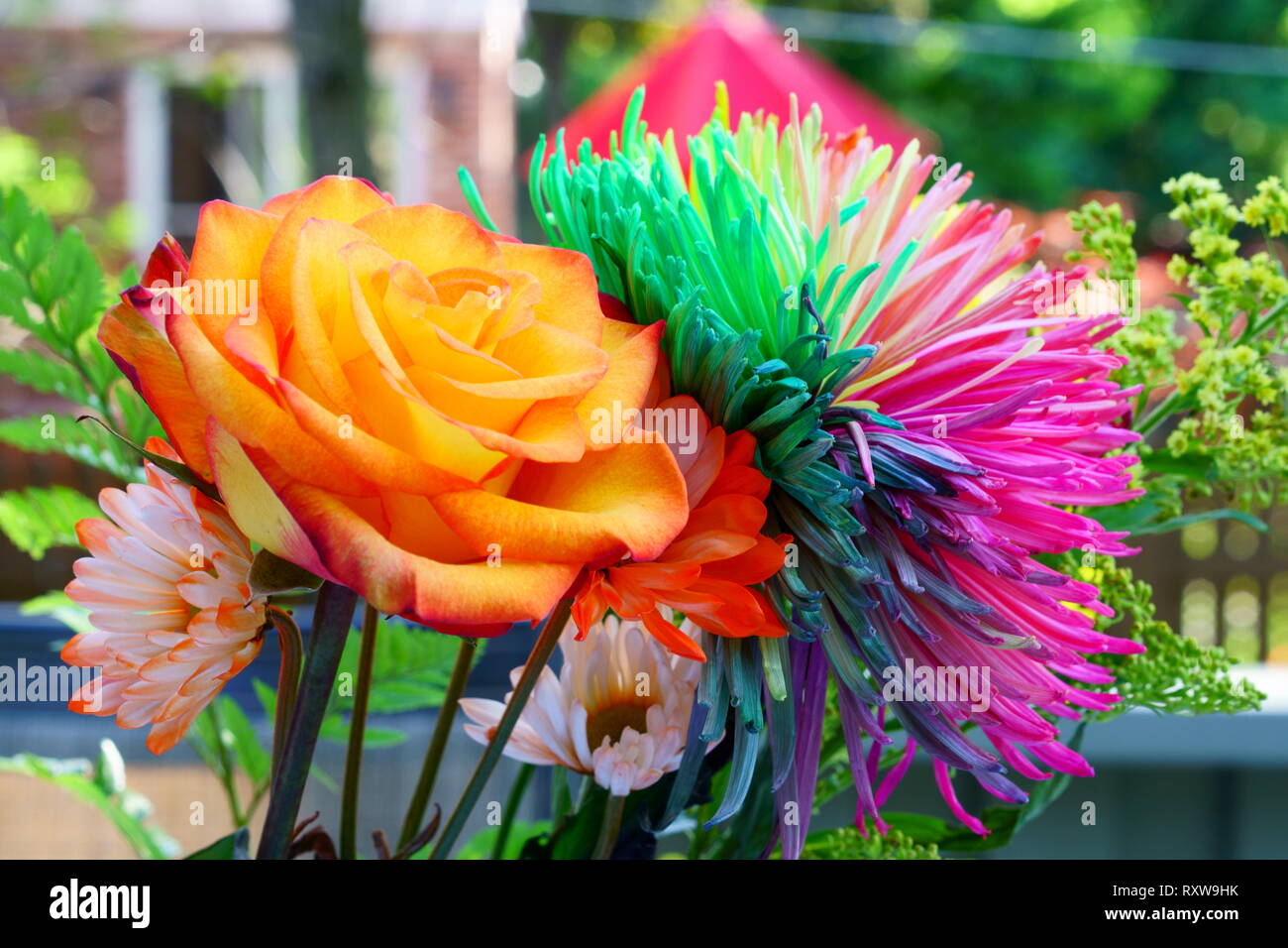 Nice and beautiful bouquet of colourful flowers outside during the day ...