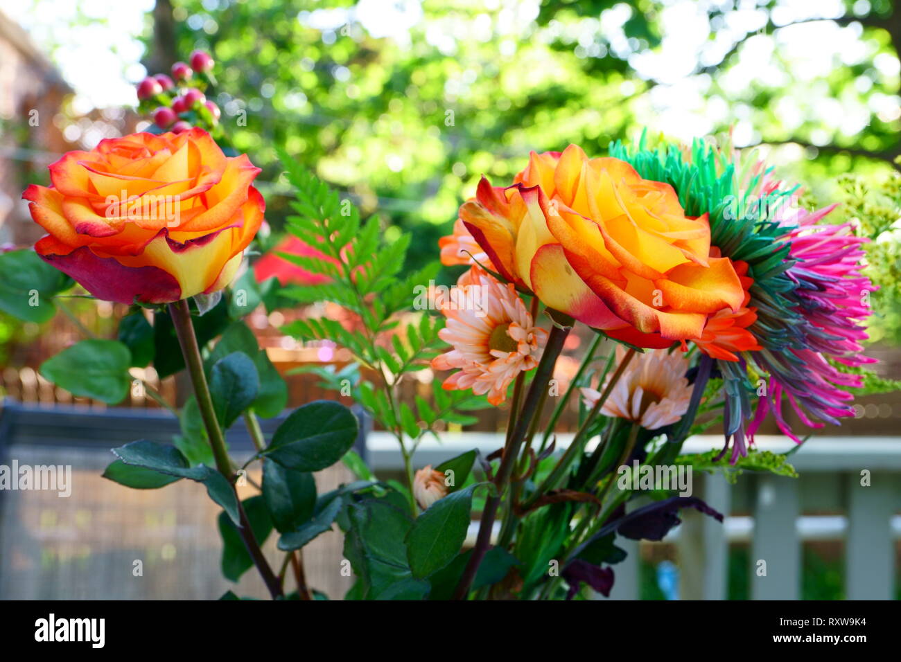 Nice and beautiful bouquet of colourful flowers outside during the day ...