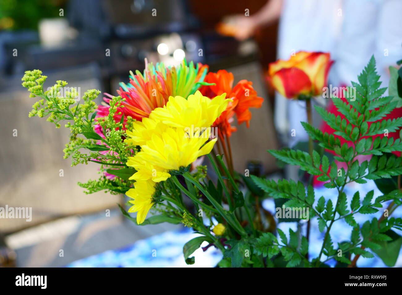 Nice and beautiful bouquet of colourful flowers outside during the day ...