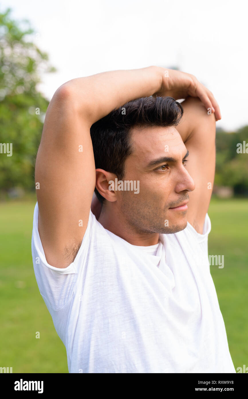 Side profile young man stretching hi-res stock photography and images ...