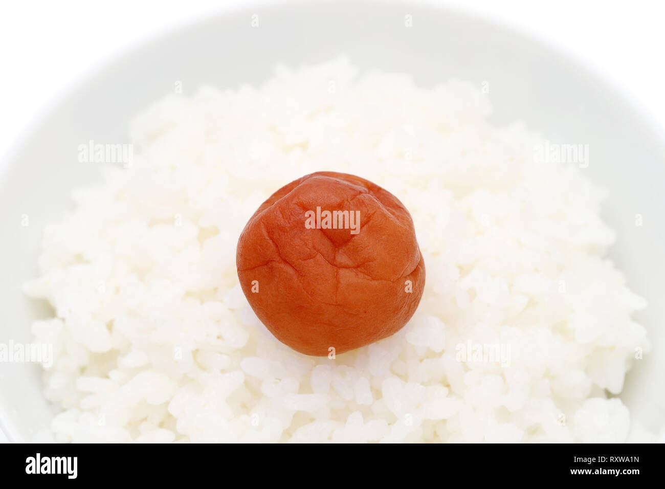 Japanese white rice and umeboshi (plum salt pickle) on a bowl Stock ...