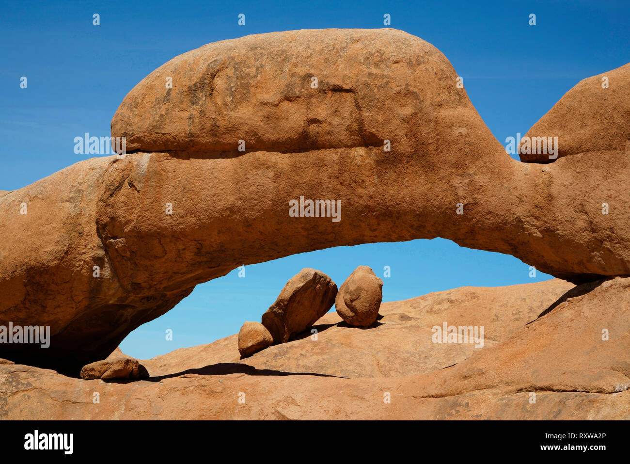 The famous natural bridge at Spitzkoppe,formed from volcanic rock ...