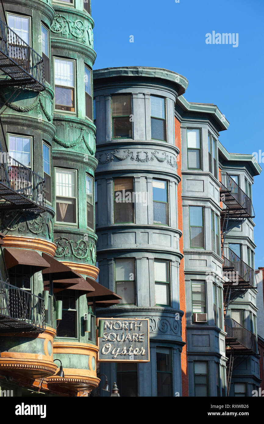 Succession of 19th century apartment buildings with rounded and angular ...