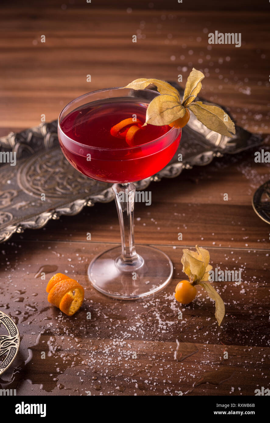 Colour Cocktail on dark wooden background Stock Photo - Alamy