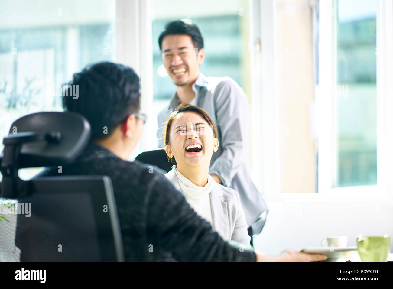 Asian business woman laughing hi-res stock photography and images - Alamy