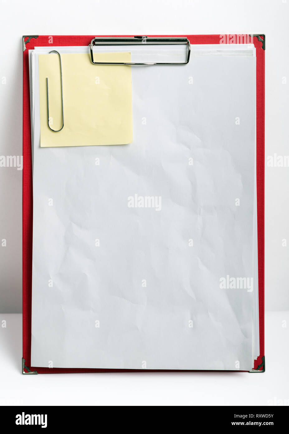 Template for design: blank crumpled paper and sticker on clipboard ...