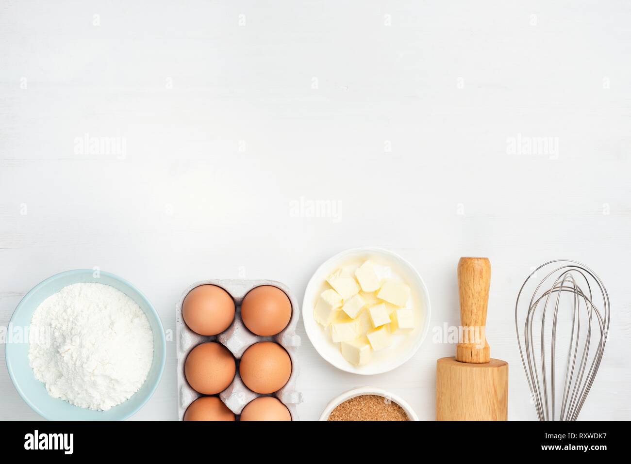 Baking ingredients and kitchen utensils on white background. Chicken ...