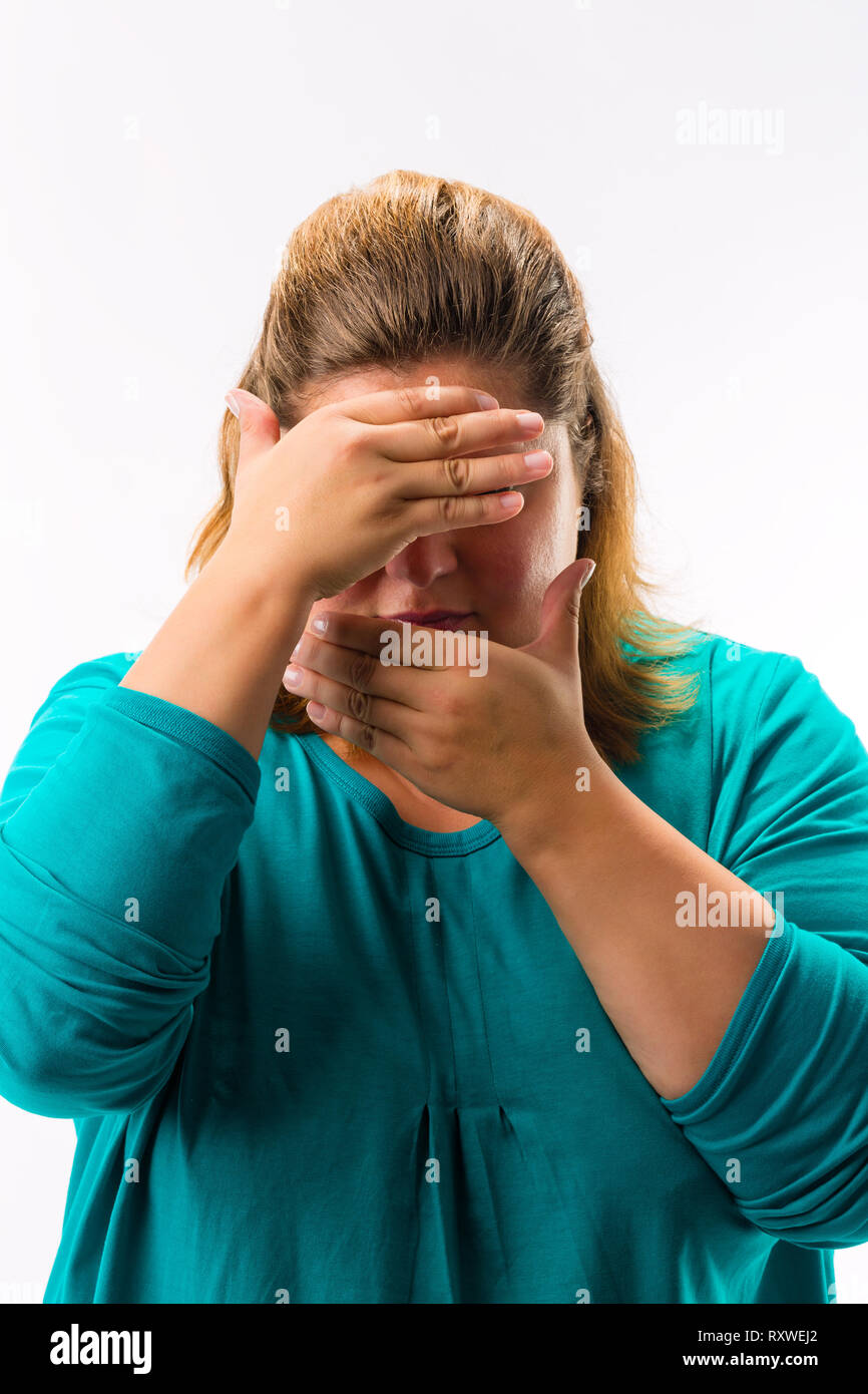 Portrait fat woman covering face hi-res stock photography and images ...