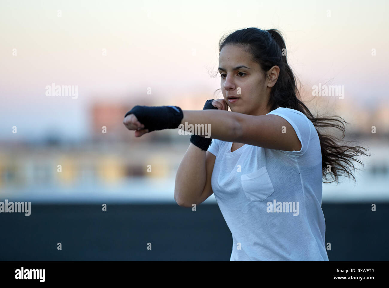 Female boxer on roof hi-res stock photography and images - Alamy