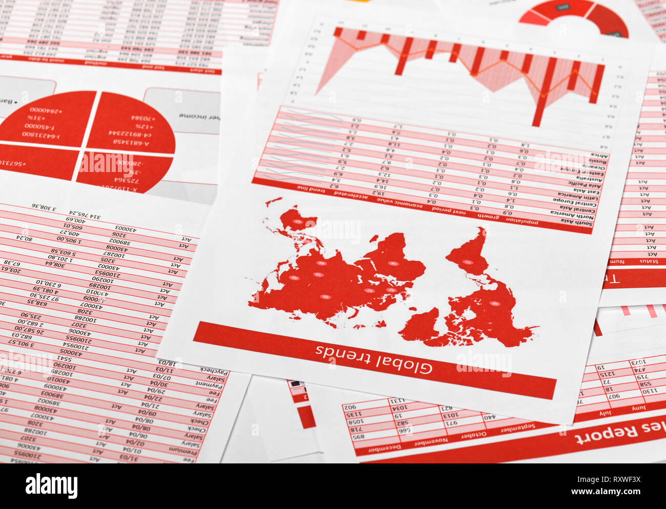 Red reports, graphs for calculating finance on desk office. Business ...