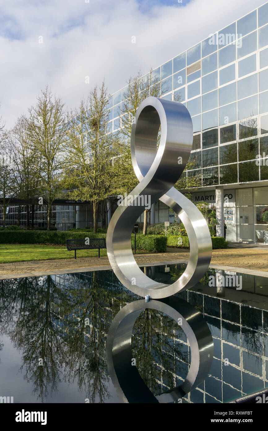 The Octo figure of eight sculpture suspended over an infinity pool ...