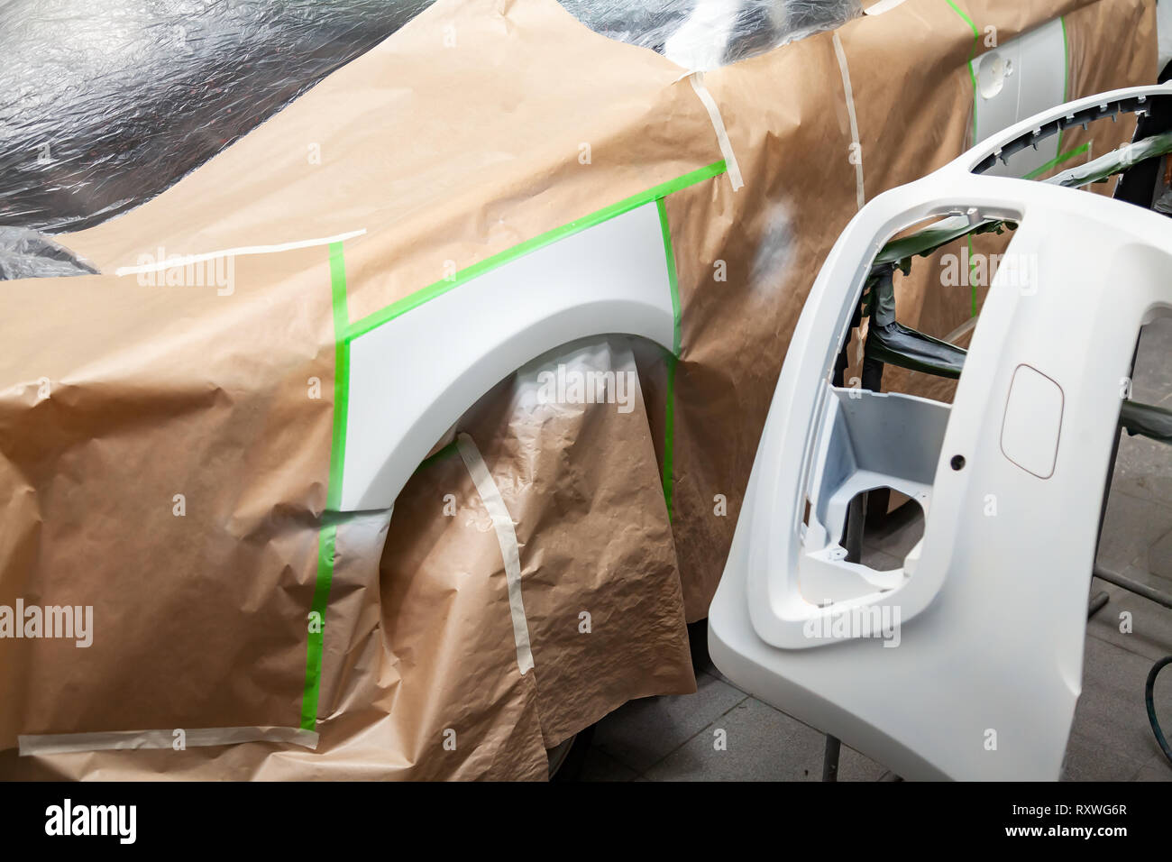 Parts of the car bumper and fender after the accident in the camera for ...