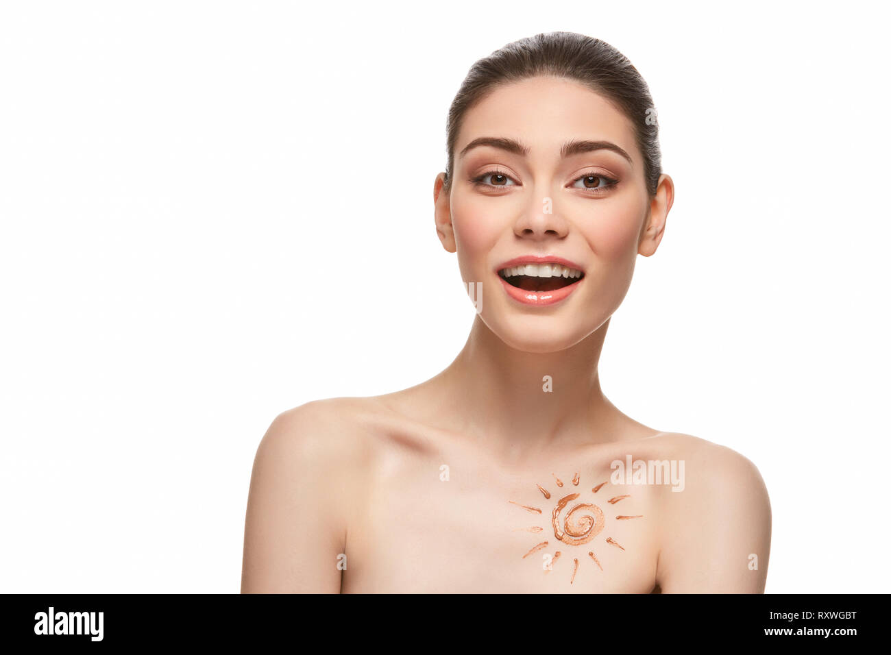 beautiful young woman with sun drawing. studio beauty shot on white ...