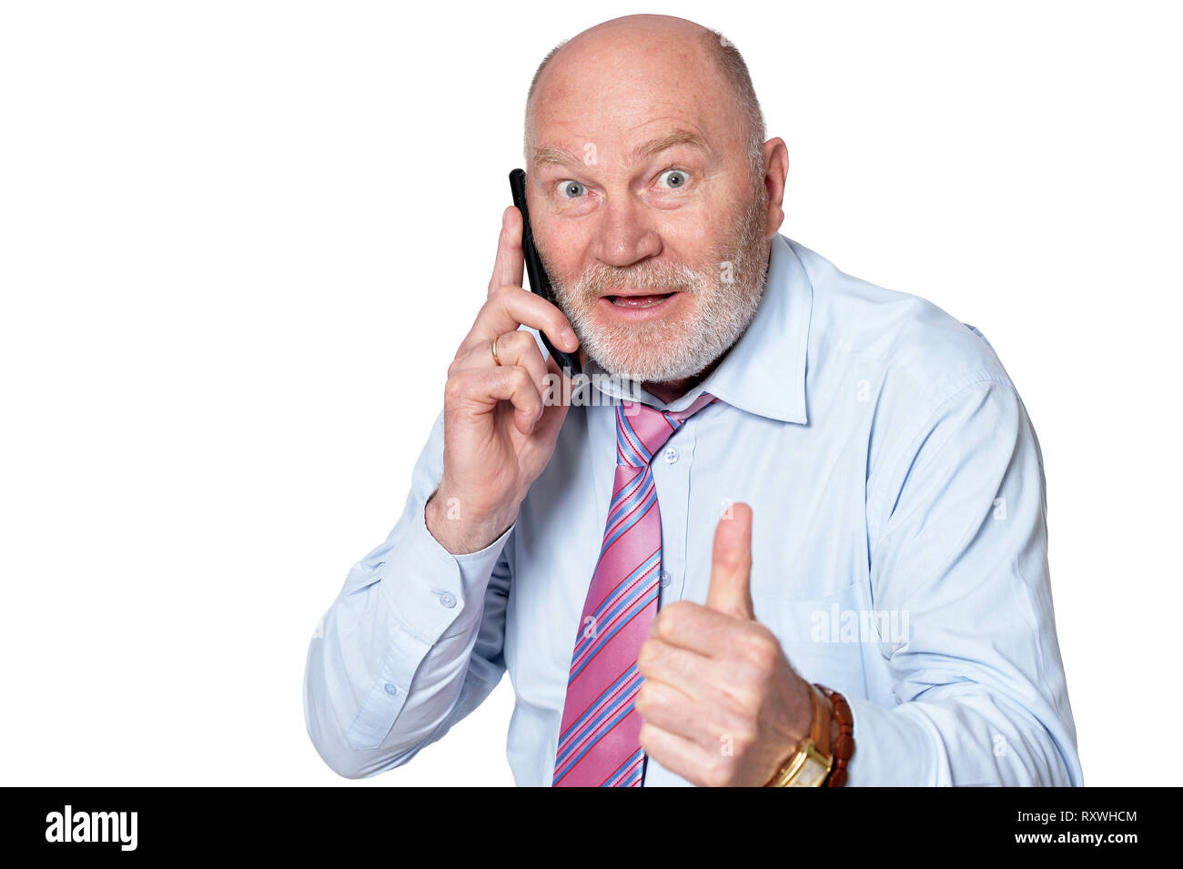 Elderly businessman talking on phone and showing thumb up on white ...